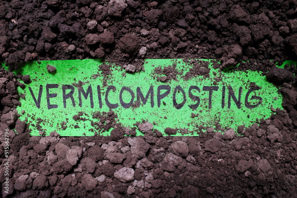 Vermicomposting organic farming concept. Written text word on soil ...