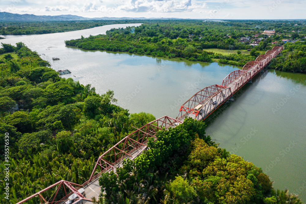Aerial of the Padilla Bridge, a truss bridge, connecting the town of ...