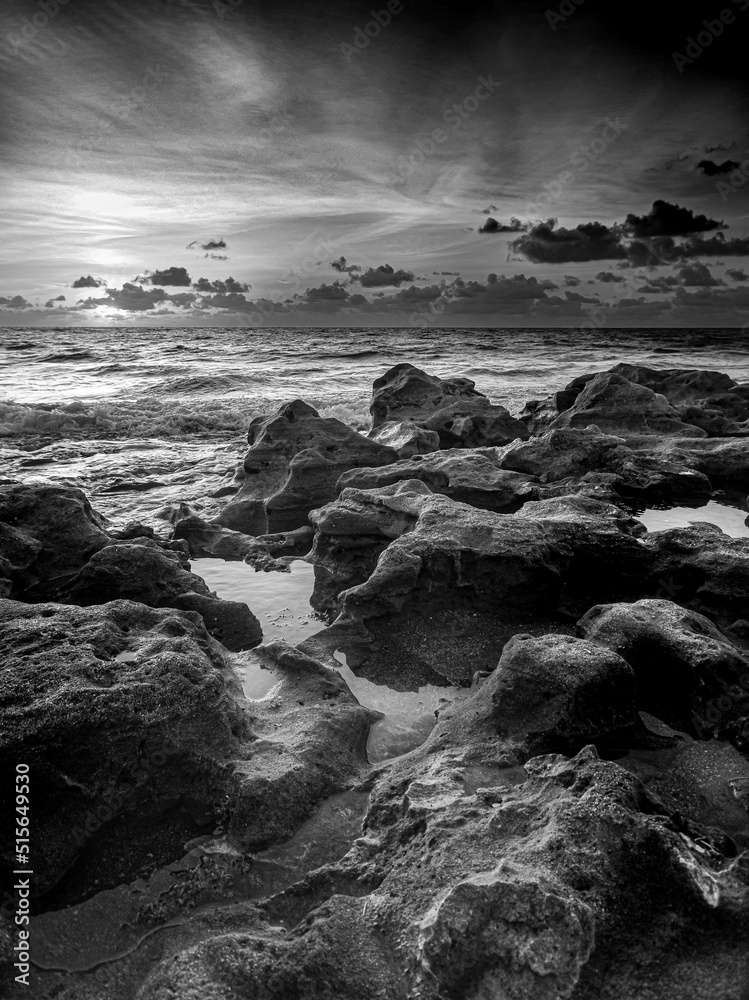 Vertical of rock formations covered with moss on beach of the Baltic ...