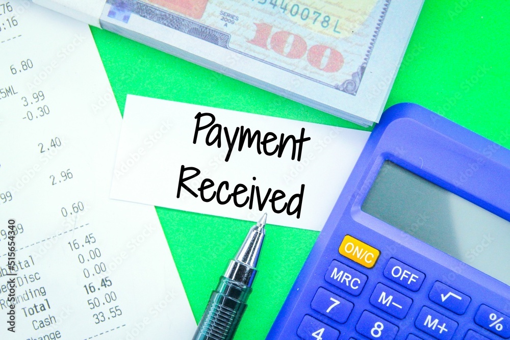 calculators, banknotes, receipts and white papers with the words ...