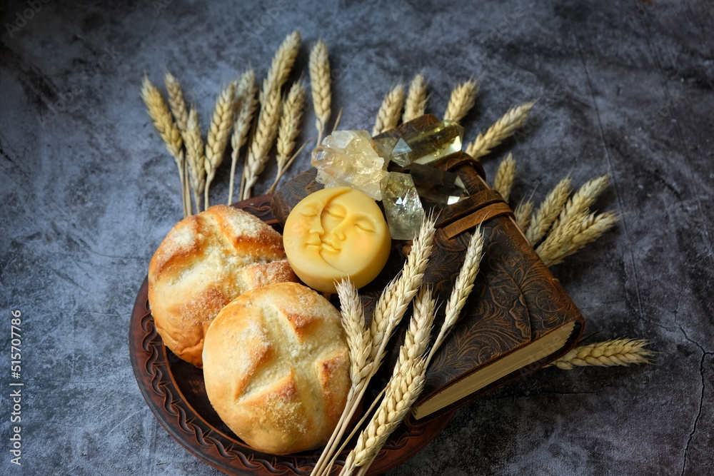 Wiccan Altar for Lammas, Lughnasadh pagan holiday. ears of wheat, bread, witch book and minerals ...