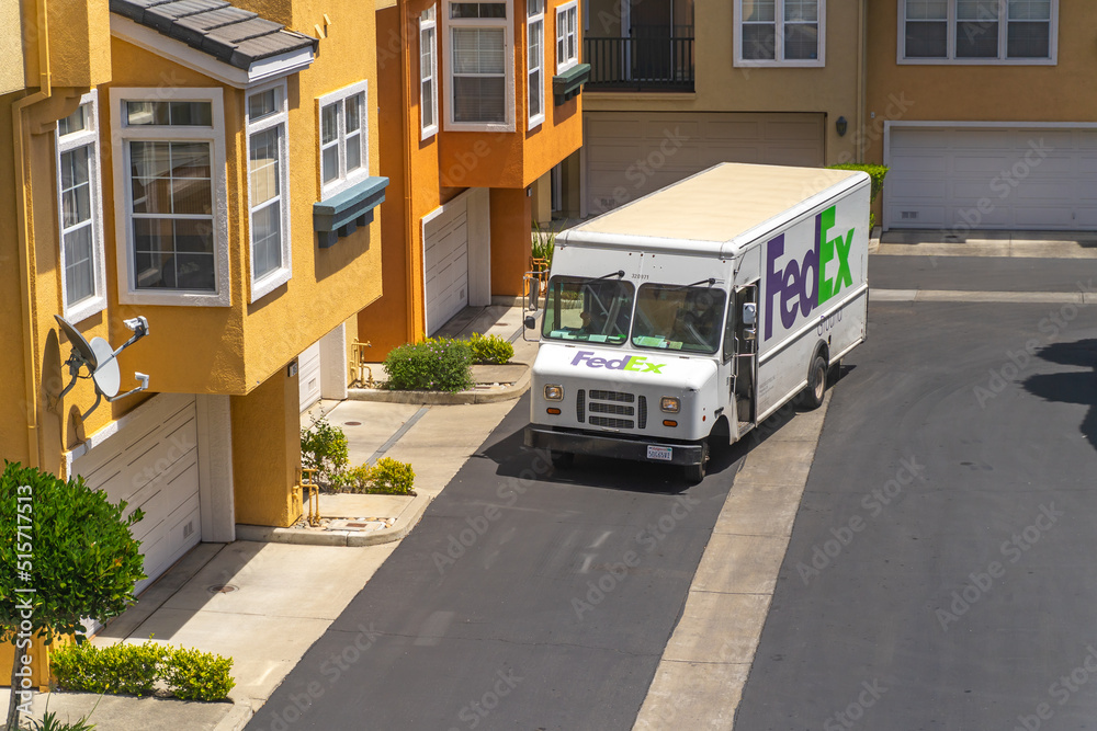 Fedex truck delivers parcels. Stock Photo | Adobe Stock