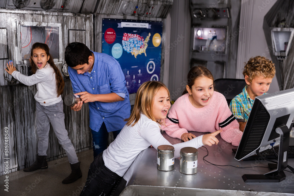 Emotional tween children using computer trying to solve riddles in ...