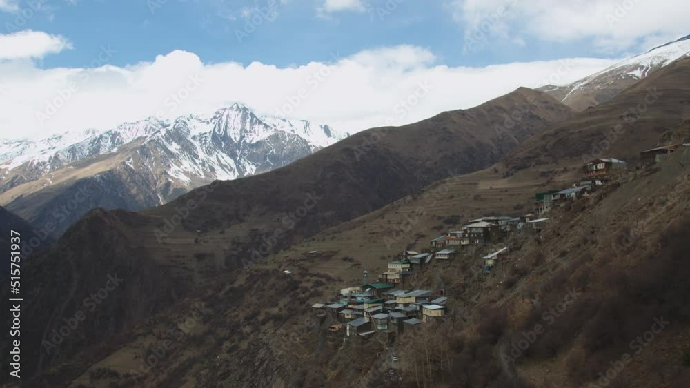 Gorgeous birds eye view of village among the scenic mountain landscape ...