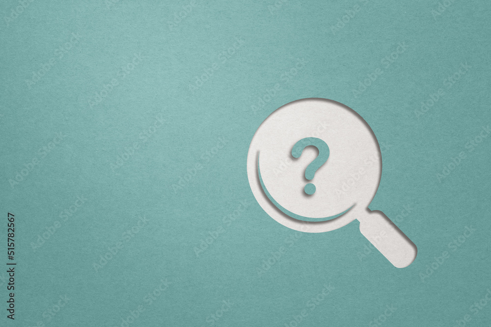 magnifying glass with question mark inside paper cut with blue ...