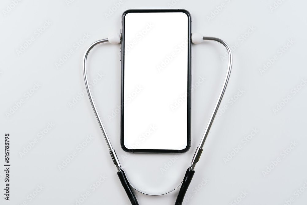 Stethoscope hang on the mobile phone to check the mobile phone with ...
