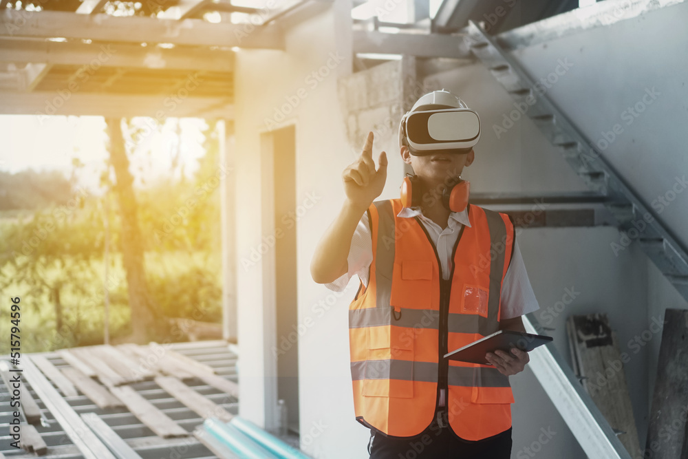 Architect or interior in VR glasses designer planning new blueprint ...