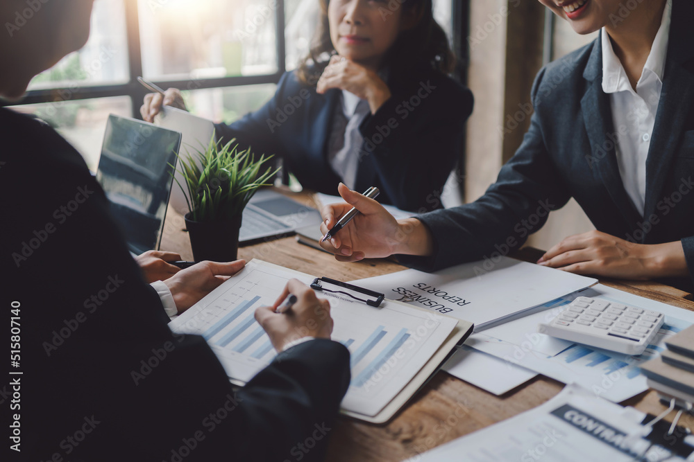 Teams of business people work together in office meeting room to plan ...