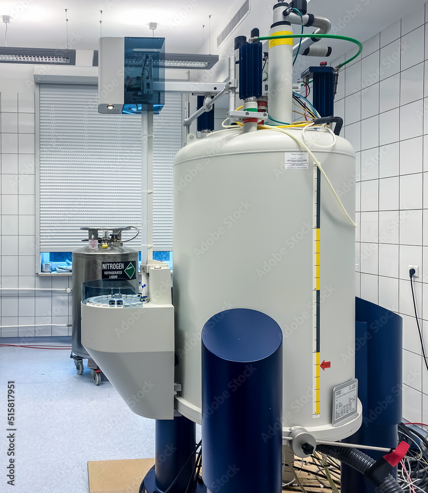 Nuclear magnetic resonance (NMR) system that contains a superconducting ...