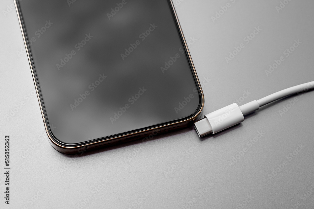 England, Newcastle, June 8, 2022: Type-C connector near the iPhone 13 ...