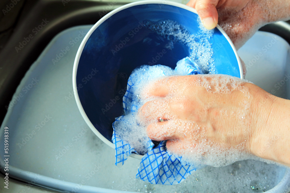 washing the dishes Stock Photo | Adobe Stock
