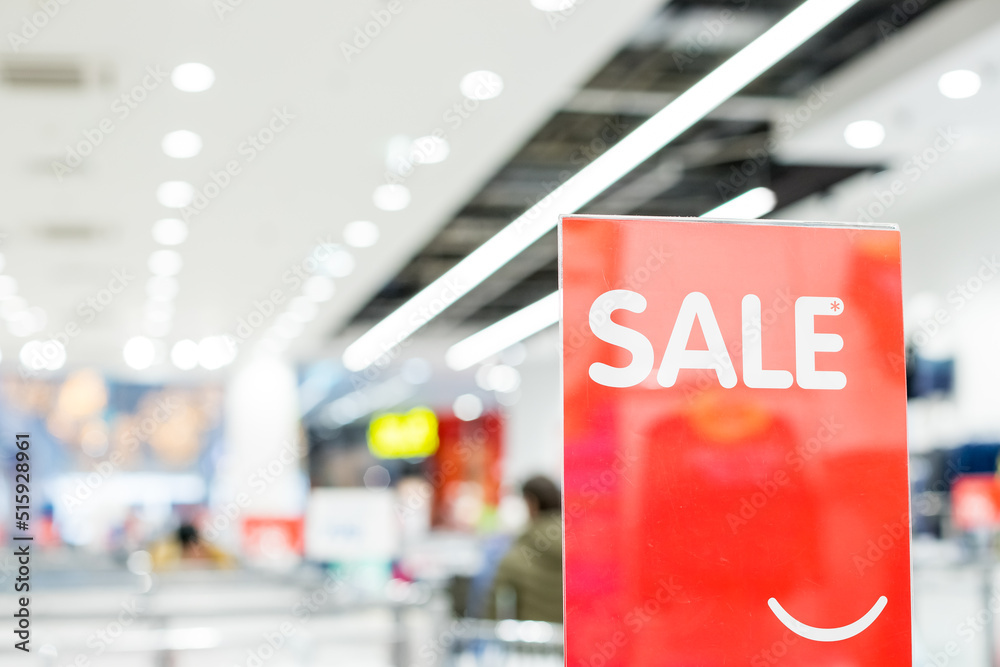 Discount percentage sign display in fashion department store during ...