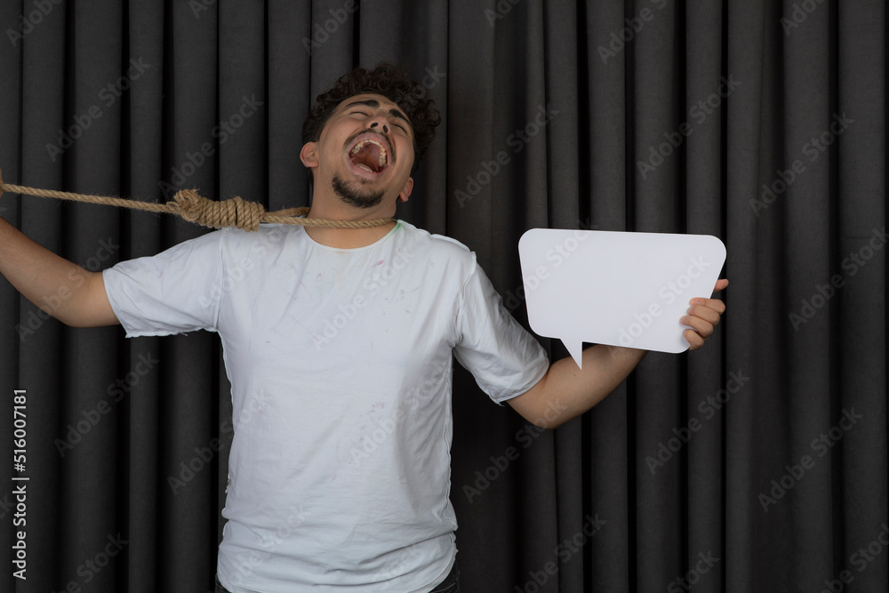 Hanged man screaming and holding idea board Stock Photo | Adobe Stock