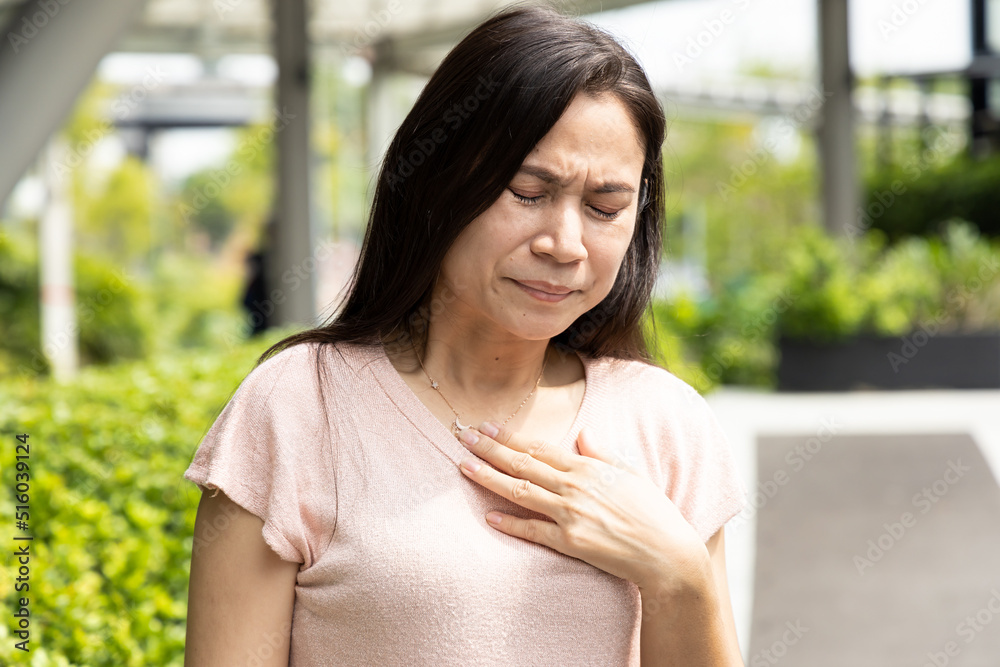 Middle-aged woman having gerd acid reflux, heartburn inflammation Stock ...