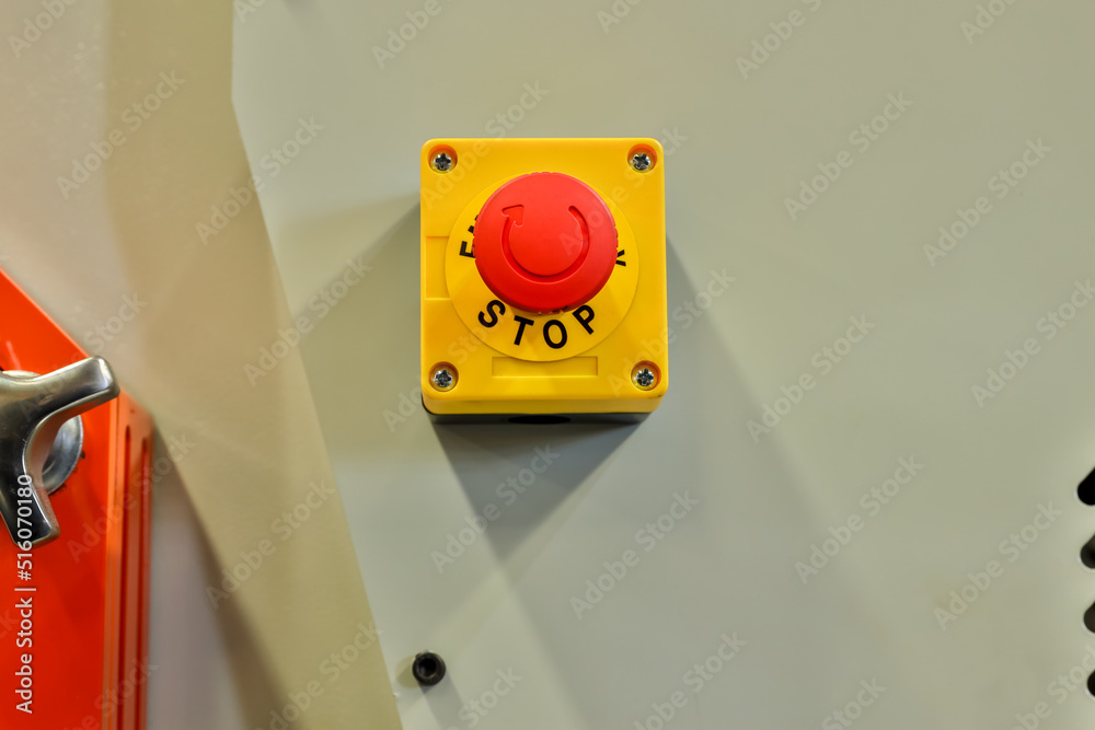 The red emergency button or stop button for Hand press. STOP Button for ...