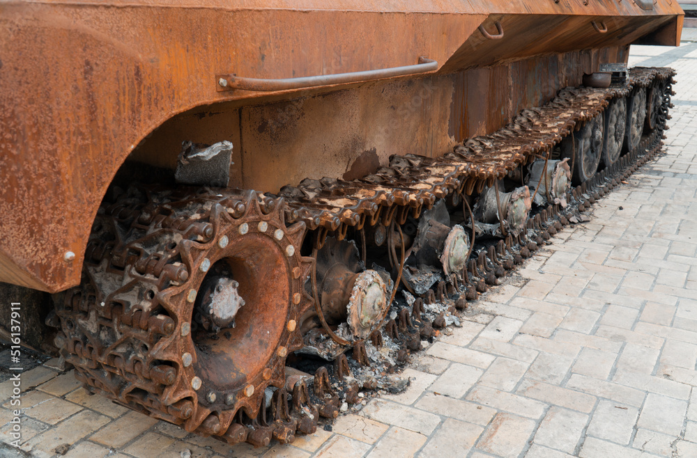 Destroyed Russian armored vehicle. Rusty armor of military equipment ...