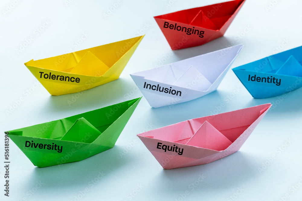 Equity, identity, marking, sign of belonging. colored paper ships of ...