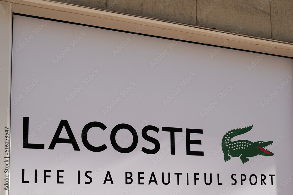 Lacoste life is beautiful sport boutique brand logo and sign text on ...