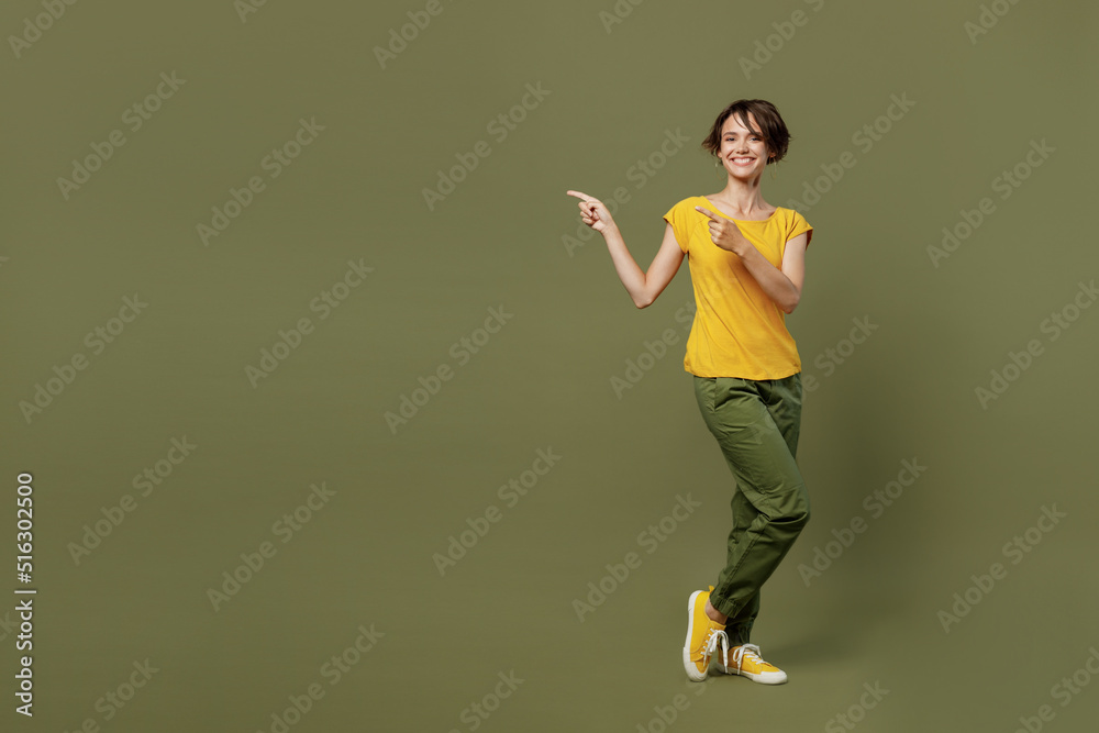 Full body young smiling happy woman she 20s wear yellow t-shirt point ...