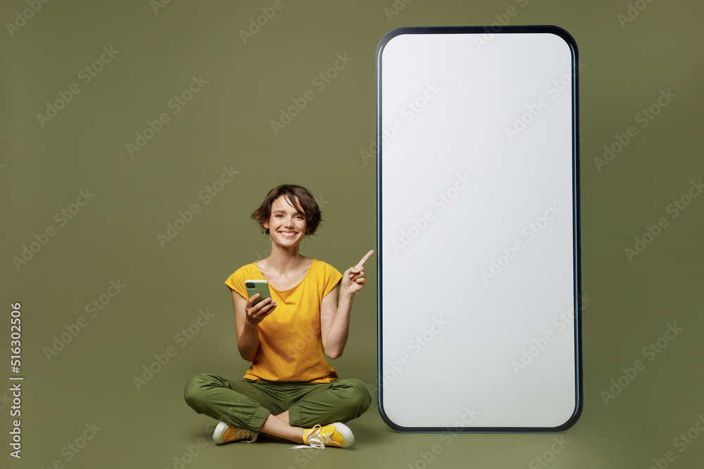 Full body young woman she 20s wear yellow t-shirt point on big huge ...