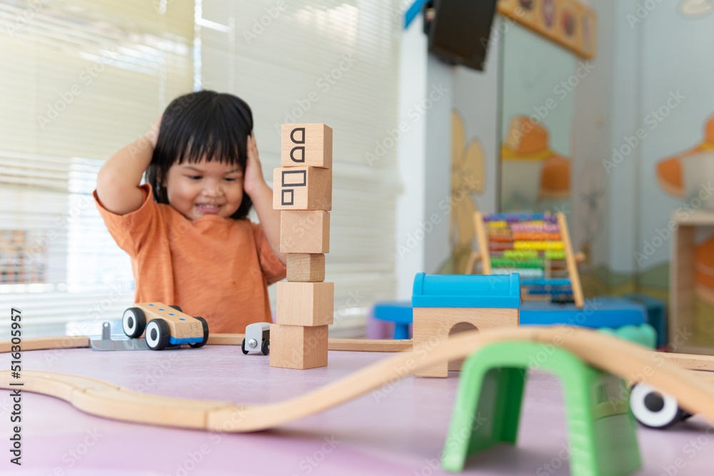 Kids intend learn from play with colorful wooden toy on table desk at ...