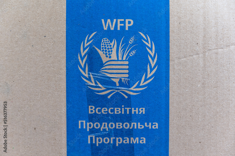 WFP logo on the cardboard box. Inscription in Ukrainian means: World ...