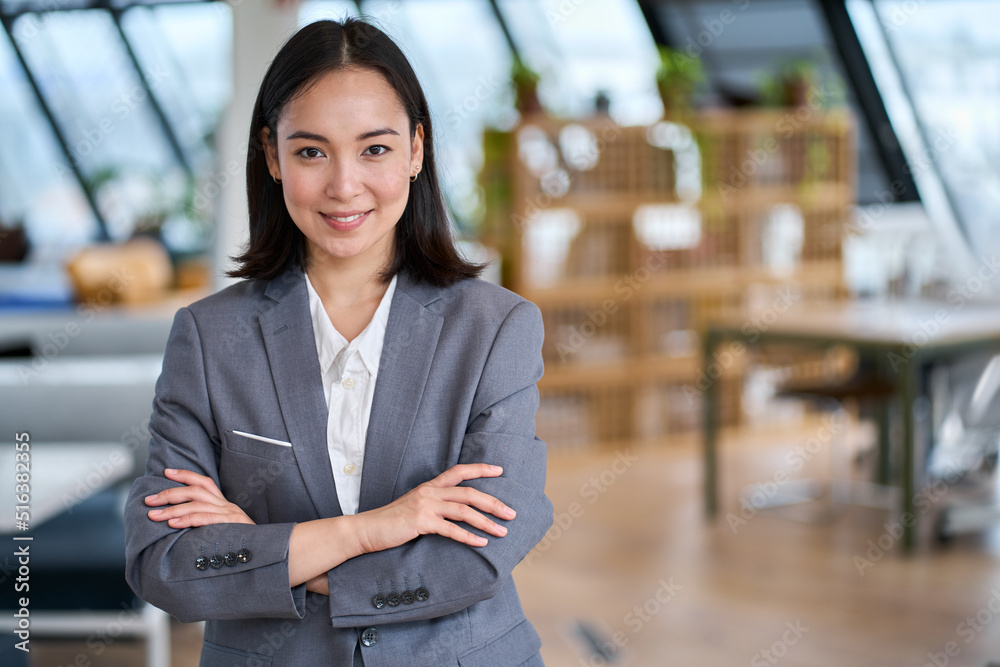 Young confident smiling Asian business woman leader, successful ...
