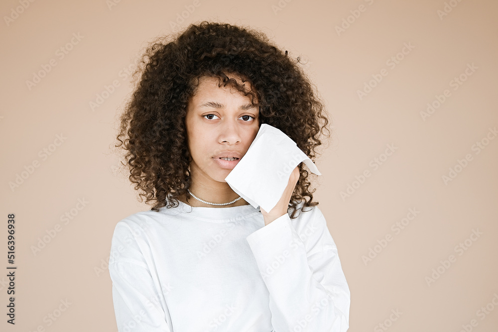 Upset doleful young african american woman sobs and cries from despair ...