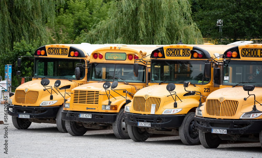 Baltow, Poland - July 1, 2022: Yellow school buses lined up in the ...