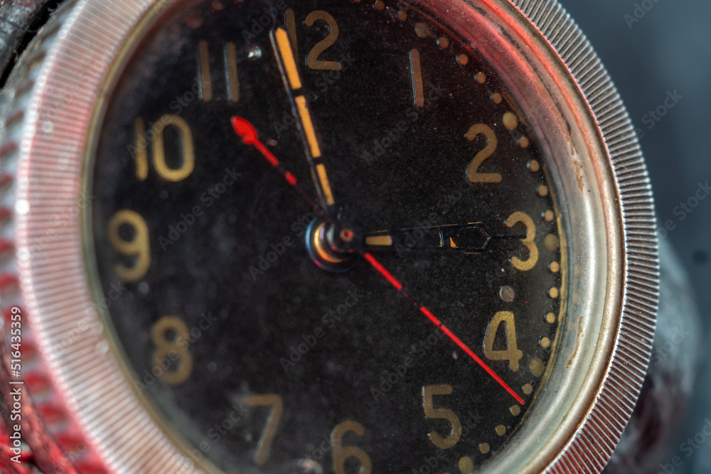 Clock face, close up. Arrows with phosphorescent, fluorescent paint ...