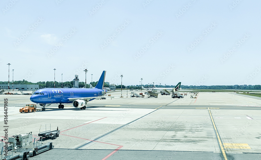 LINATE AIRPORT, ITALY - CIRCA JUNE 2022: airport operations in the ...