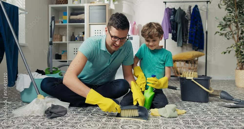 Vídeo do Stock: Handsome young man wiping dance floor. Concept of ...