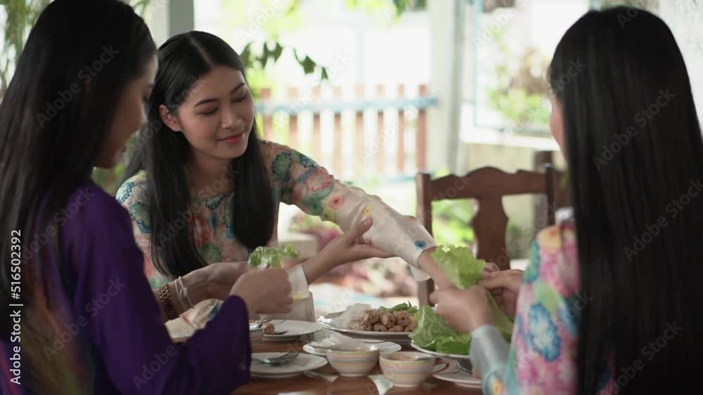 Vietnamese beautiful women in traditional costumes eat food Vietnamese ...