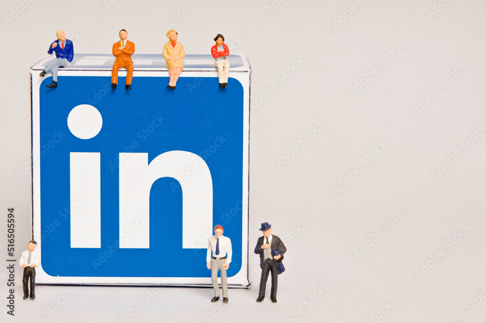 miniature figurines of people and social media logo of Linkedin Stock ...