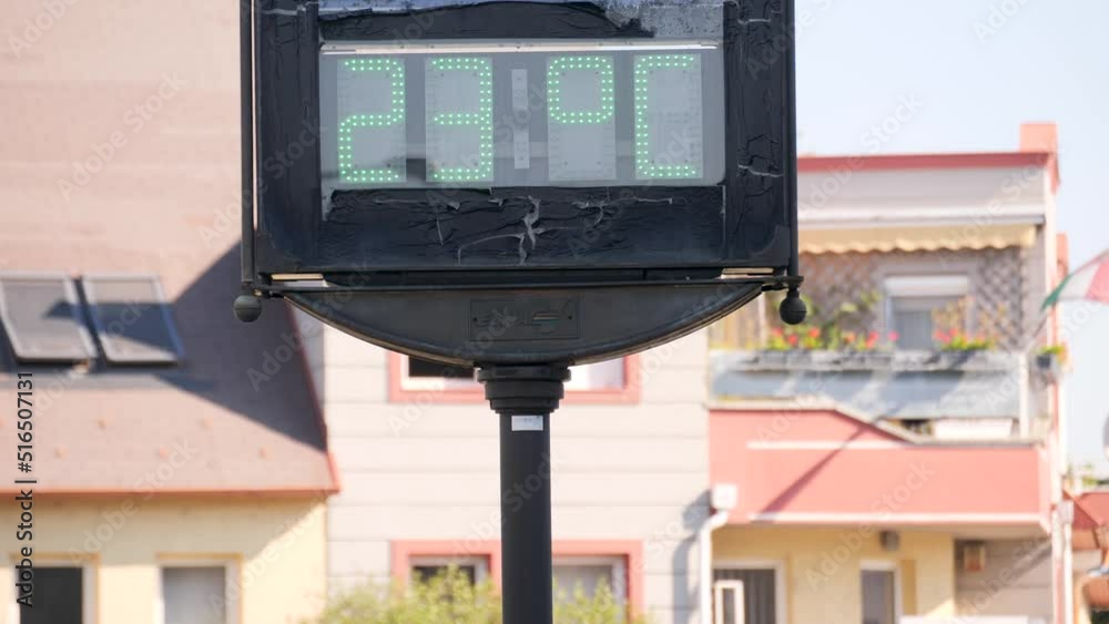 Thermometer screen marking 23 degrees celsius High Temperature in hot ...