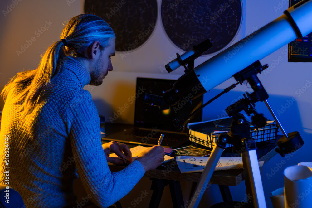 Astronomer man do astronomy work. Telescope pointing on the night sky ...