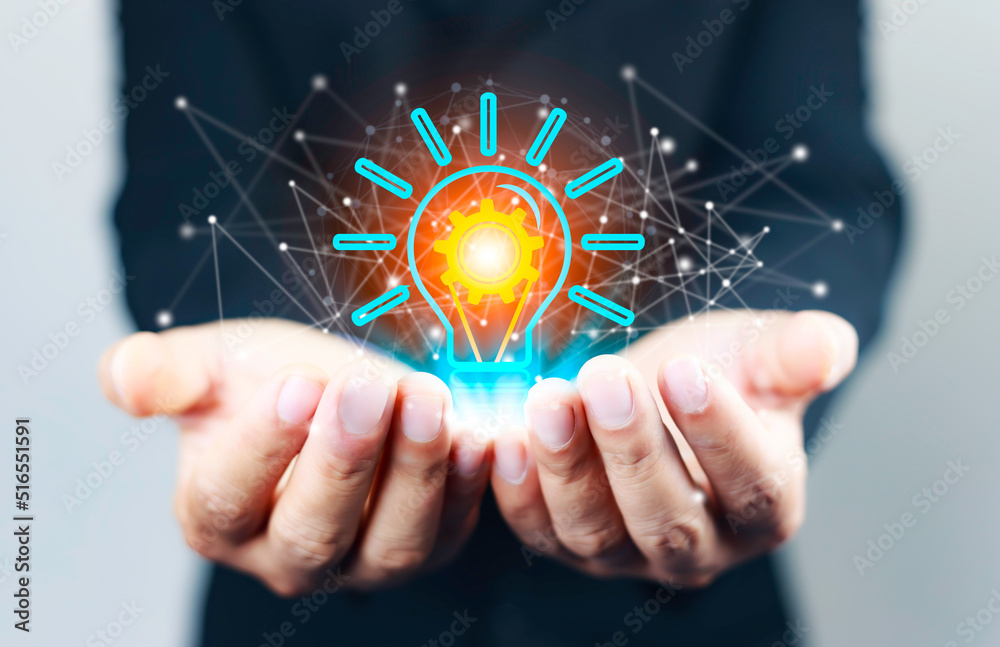 Innovation technology Concept. Hand Touching Icon Bulb. Concept with ...