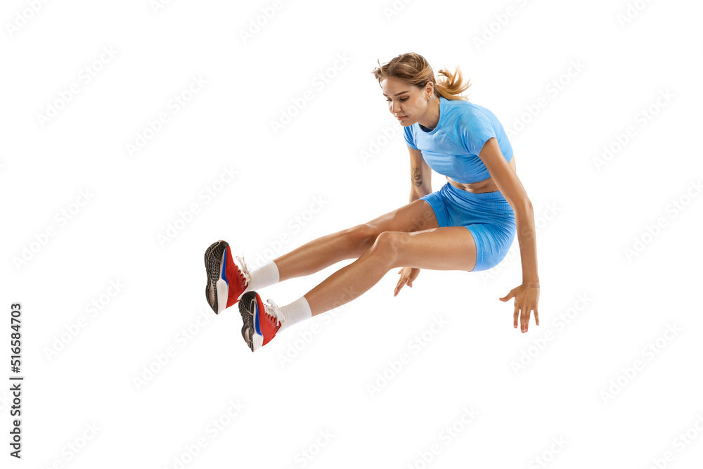 Triple jump technique. Studio shot of female athlete in sports uniform ...