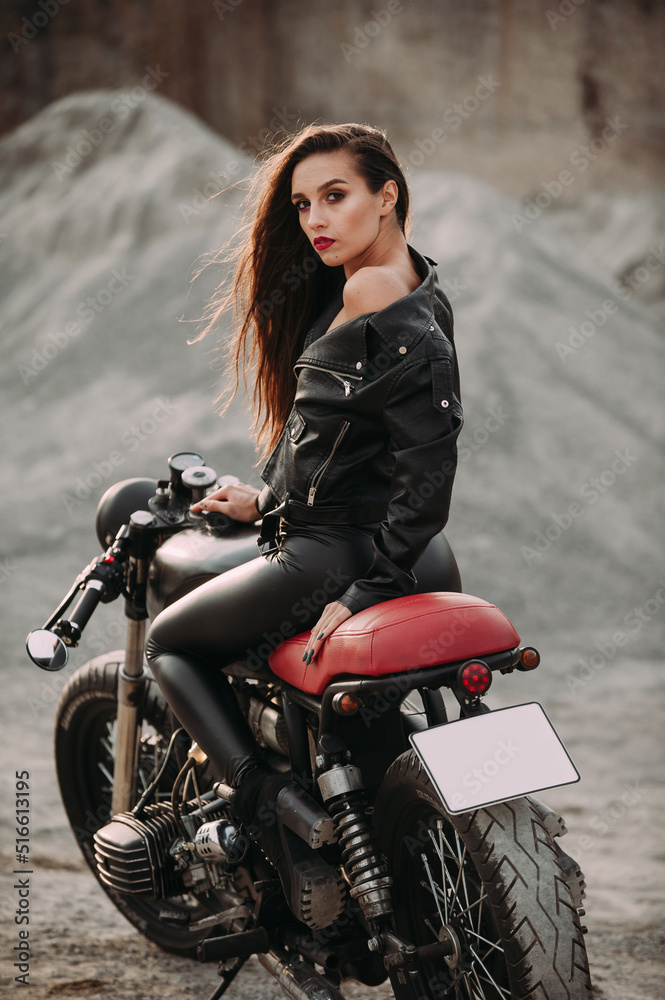 beautiful girl with long dark hair red lips in a black jacket and black ...