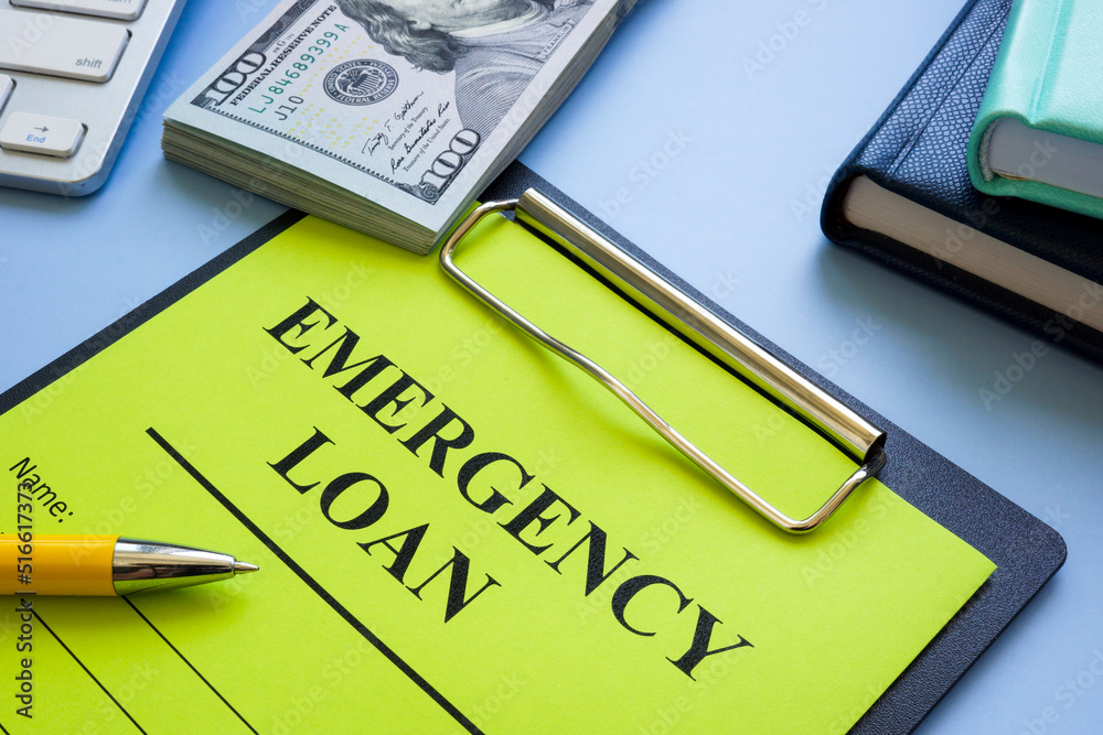 Emergency loan application with clipboard and money. Stock Photo ...