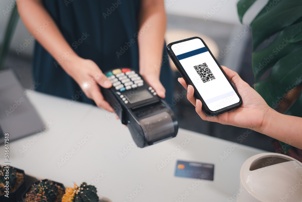 Fotografia do Stock: Businesses pay by scanning a QR code in a ...