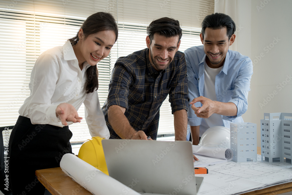 Engineer teamwork with architect drawing construction project Stock ...