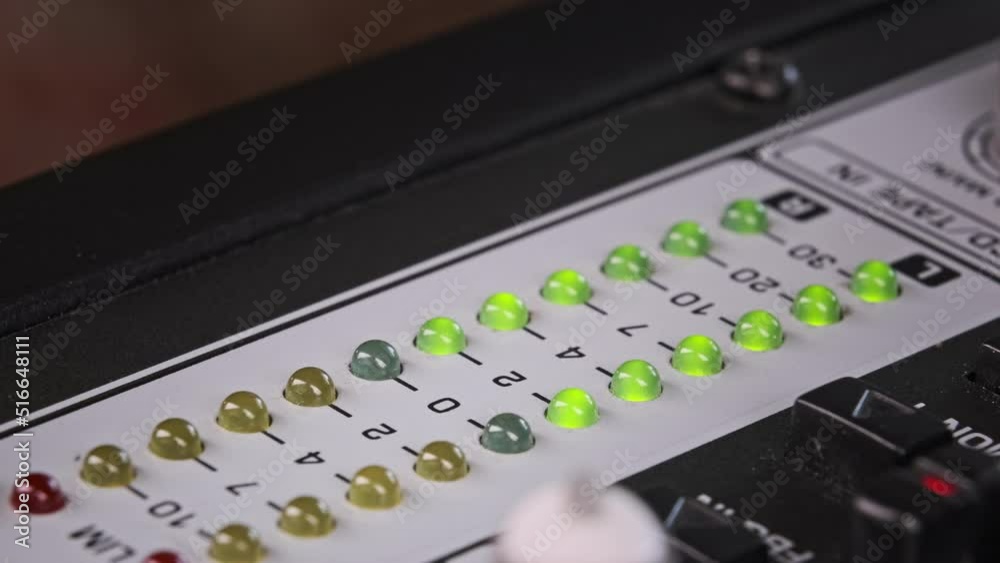 LED indicator of sound level signal on the mixing console. LED strip in ...