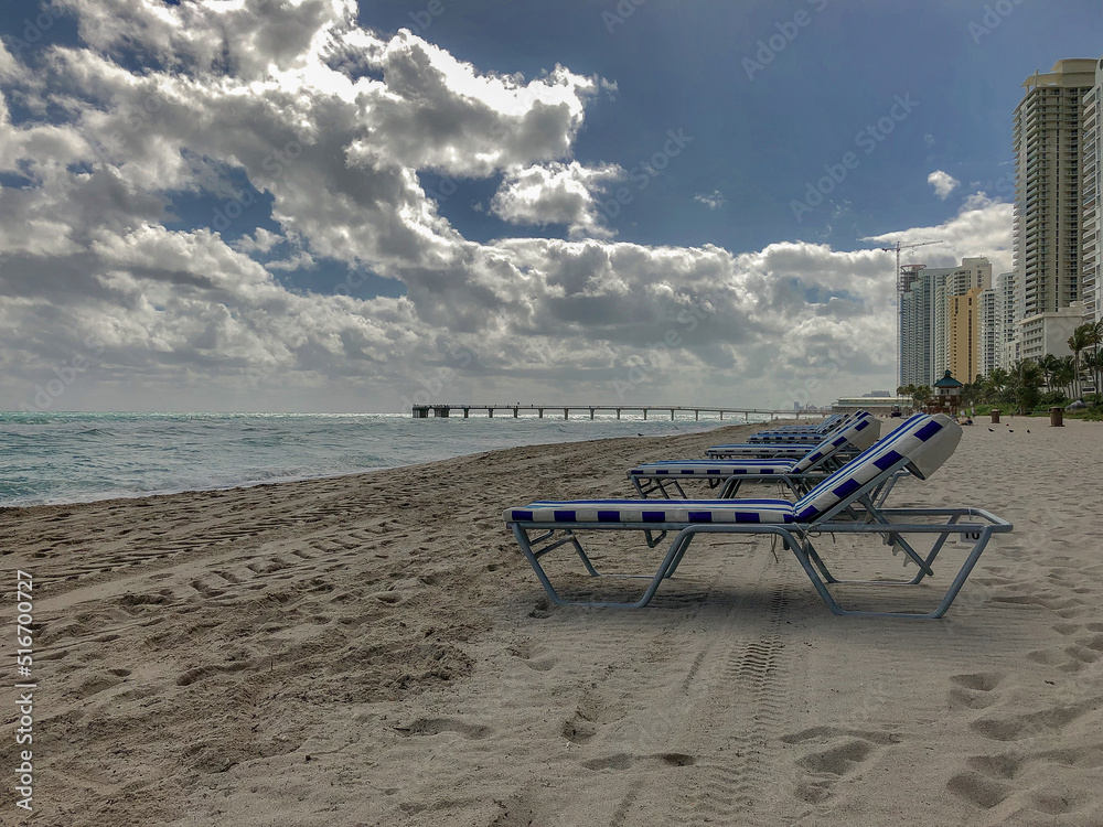 Oceanfront resort hotels skyline of Miami Beach with skyscraper houses ...
