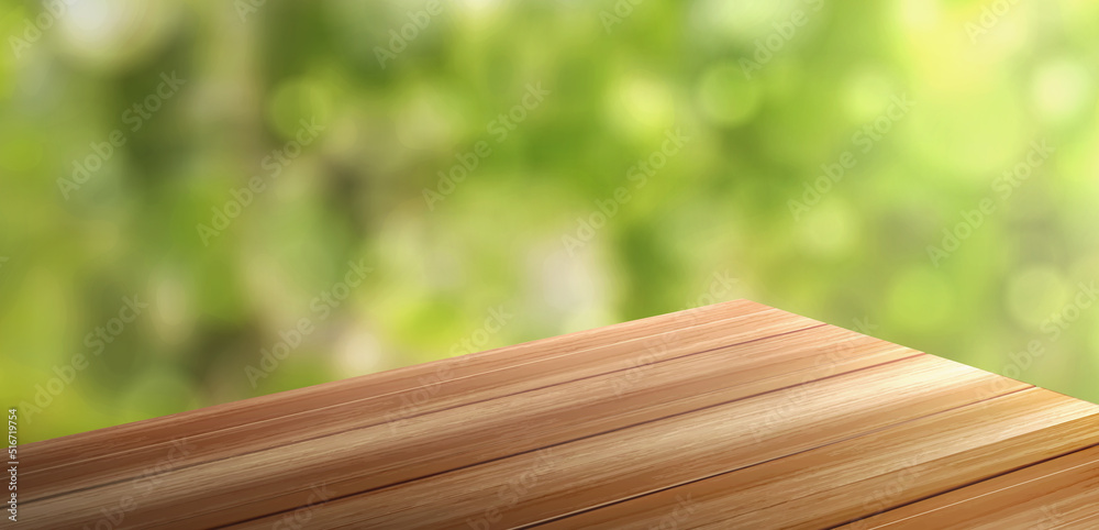 Wooden table corner perspective view on green blurred background ...