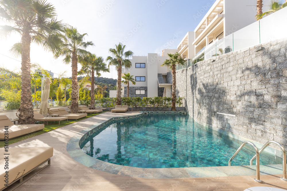 Sea hotel resort with swimming pool in the morning Stock Photo | Adobe ...