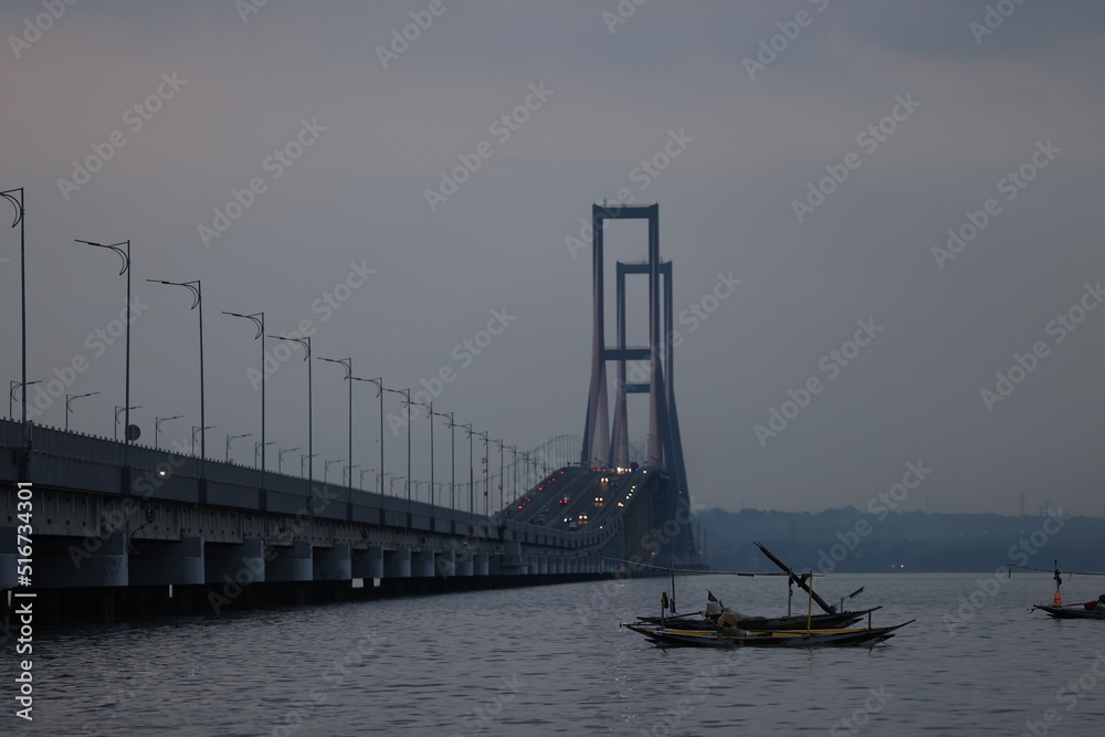 The Suramadu Bridge at Twilight with colorful lighting in Surabaya ...