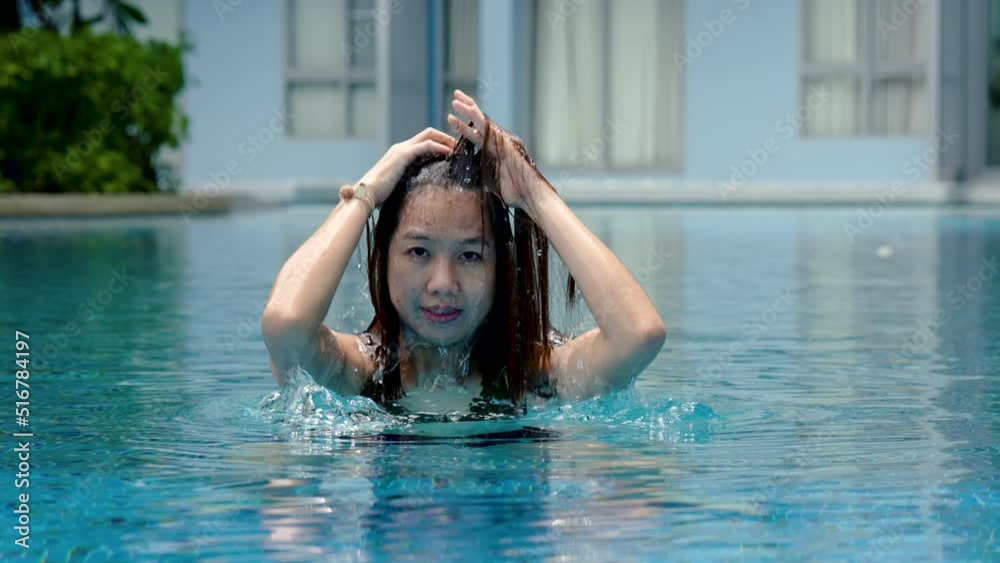 4k Woman Diving Happily In The Swimming Pool A Cute Teenage Asian