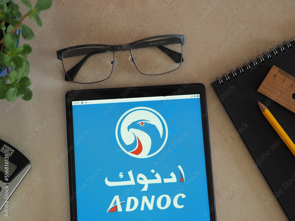In this photo illustration, Abu Dhabi National Oil Company (ADNOC) logo ...