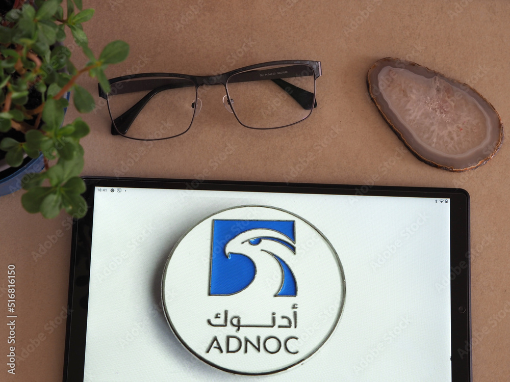 In this photo illustration, Abu Dhabi National Oil Company (ADNOC) logo ...